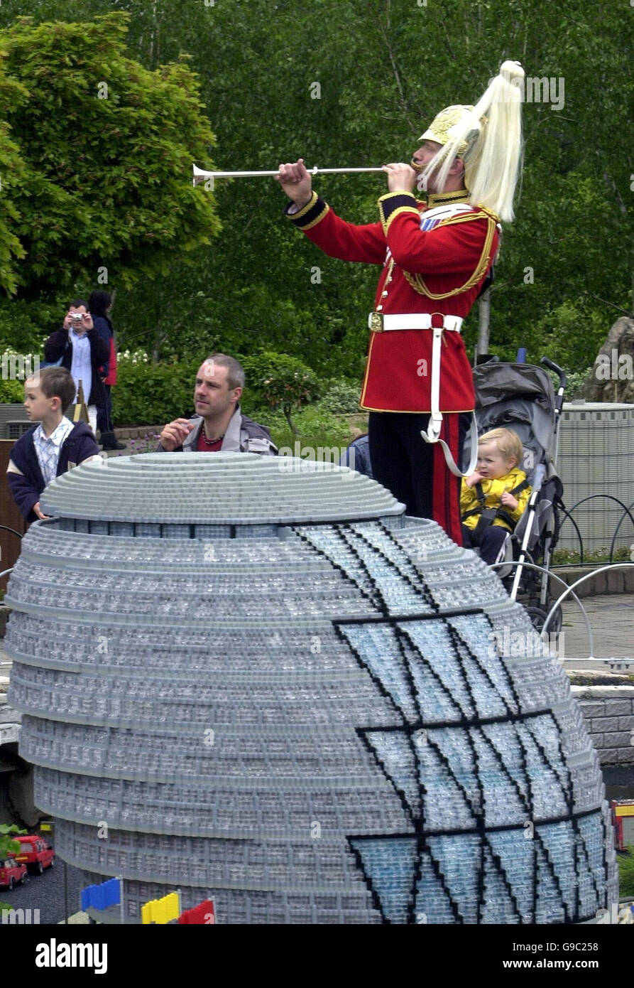 The band of the Life Guards perform by a model of City Hall, at ...