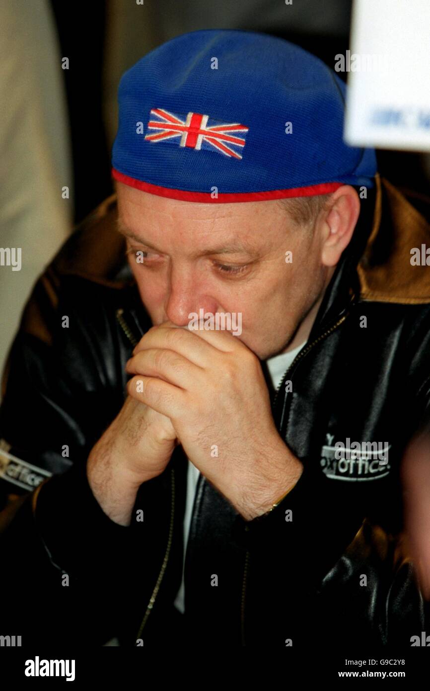 Boxing manager Frank Maloney sits alone with his thoughts as ...
