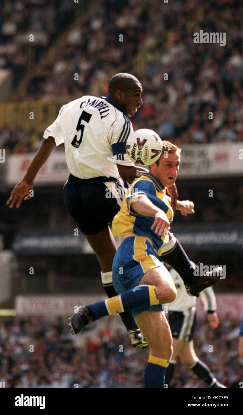 Tottenham hotspurs sol campbell outjumps derby countys horacio ...