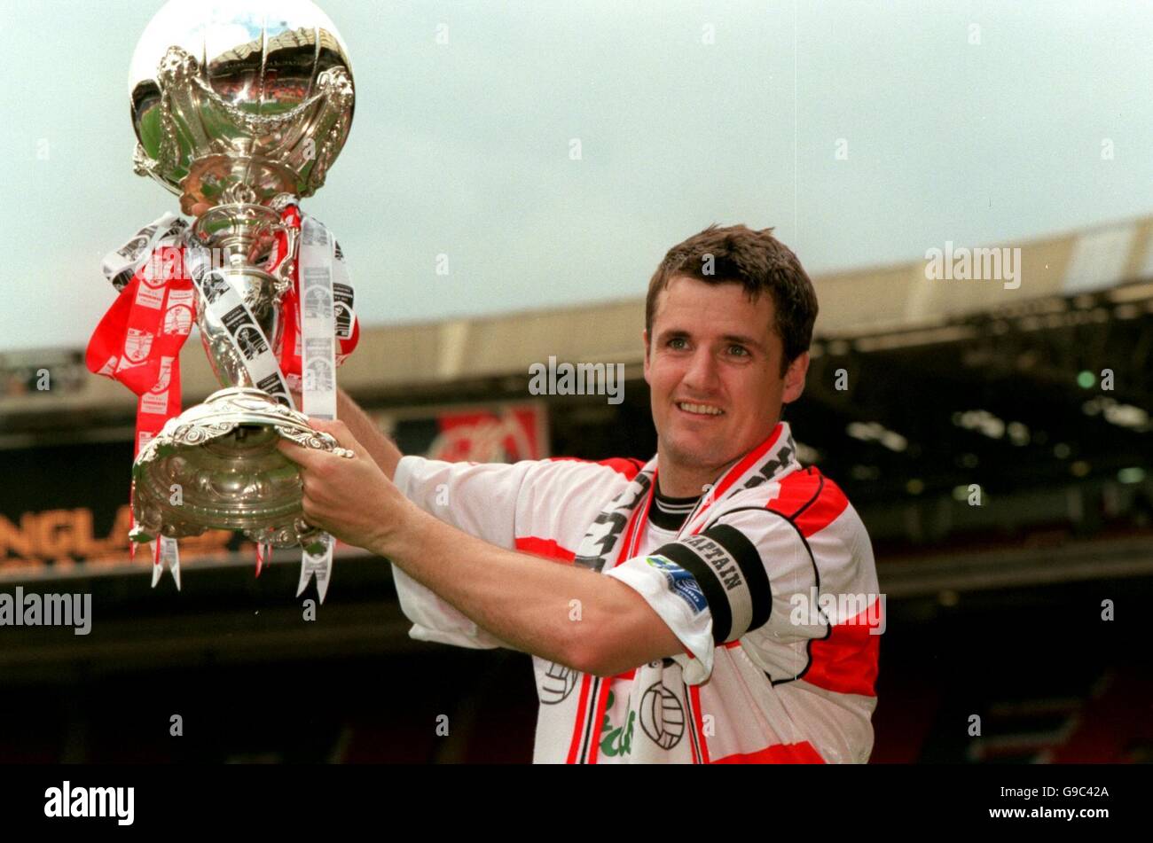 Kingstonians captain matt crossley celebrates with the trophy hi-res ...