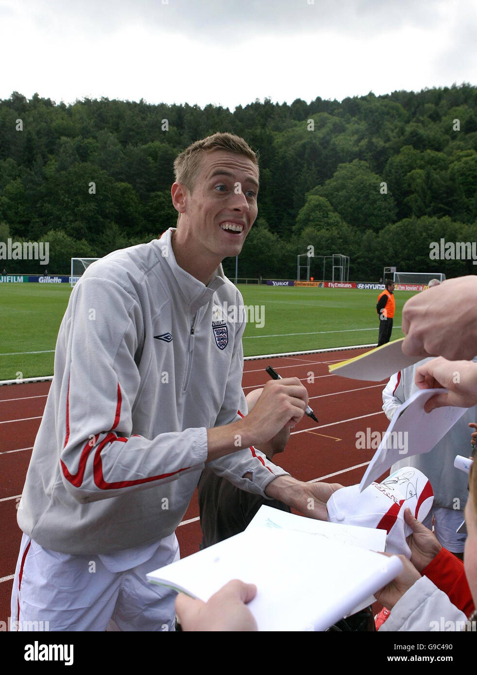 SOCCER England. England's Peter Crouch signs his autograph during a ...