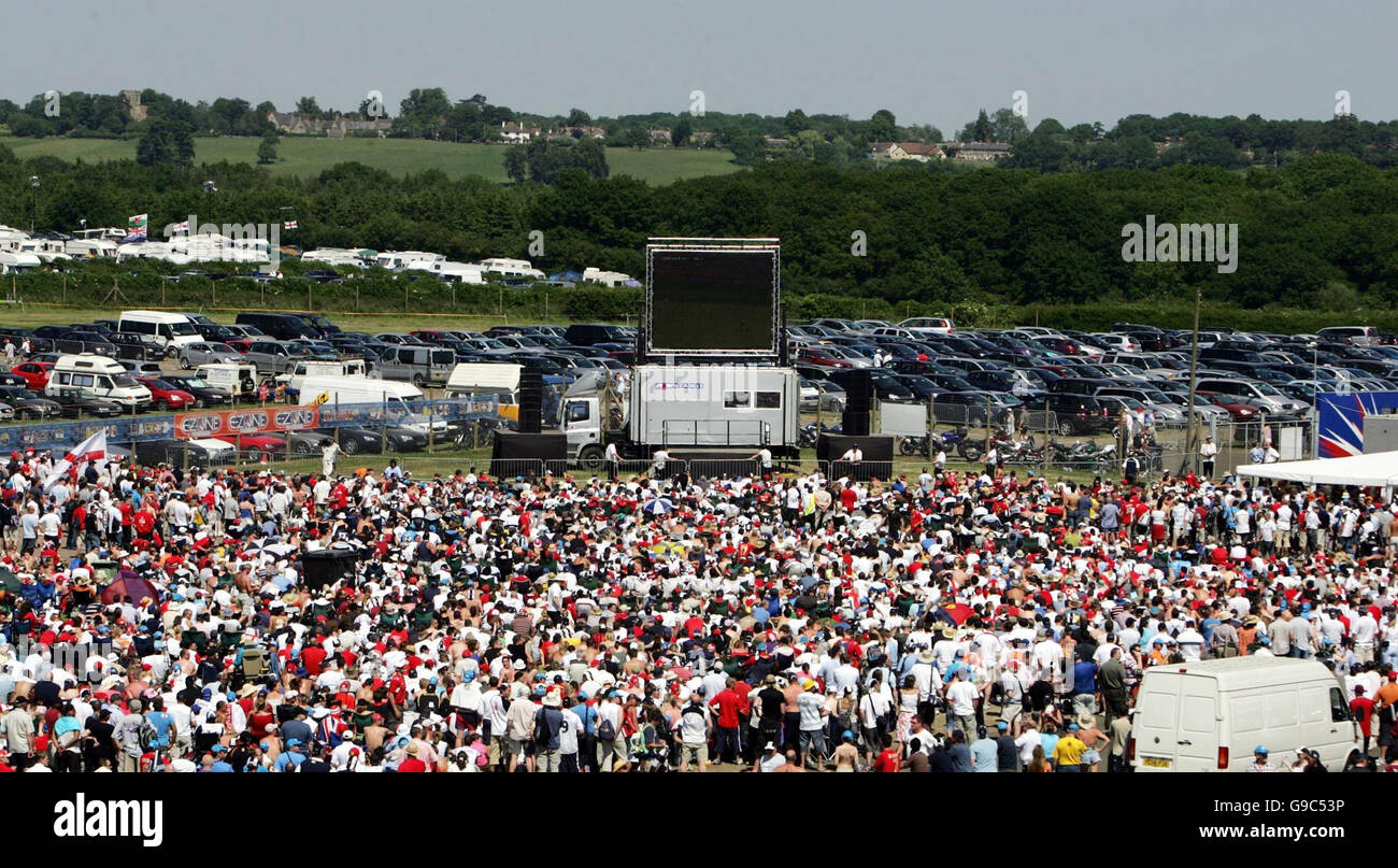 Fans at the British Grand Prix at Silverstone watch England's opening ...
