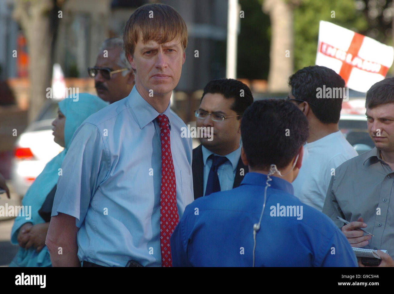 Stephen Timms MP for East Ham looks on outside the house targeted in an ...