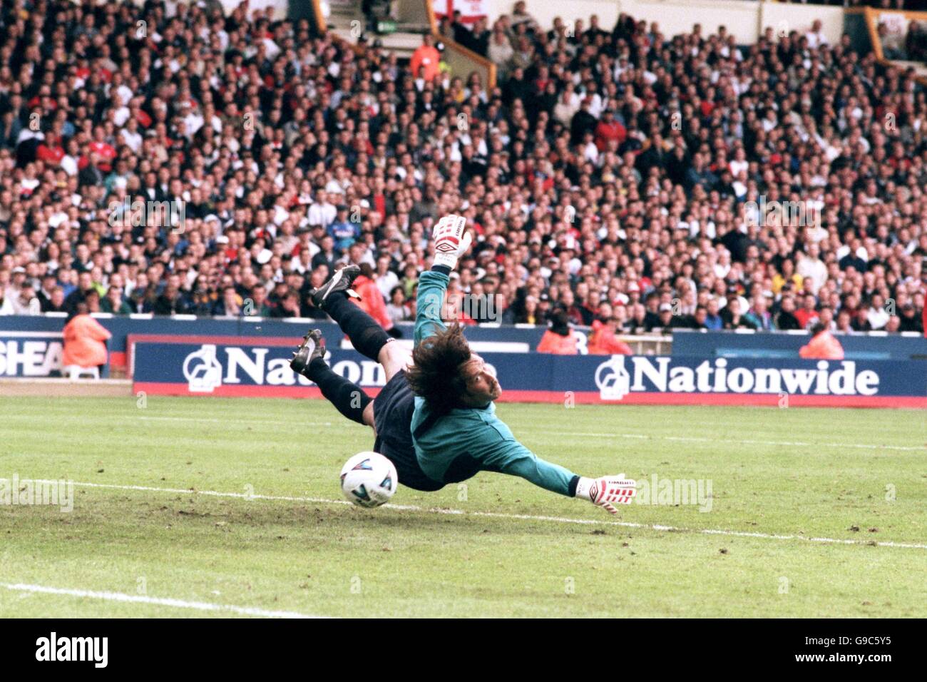 Full length diving action football hi-res stock photography and images ...