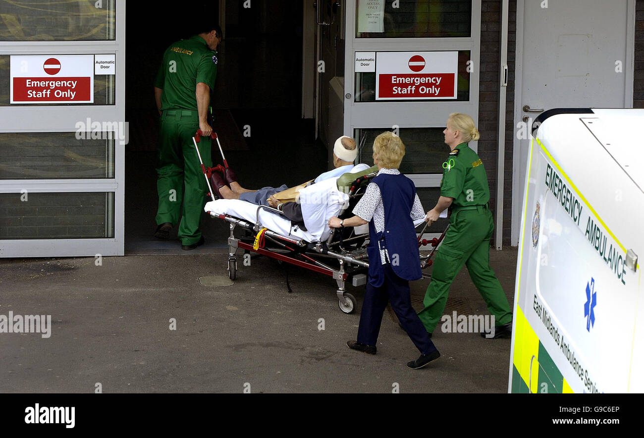 Generic stock picture of an ambulance crew (paramedics) taking a ...