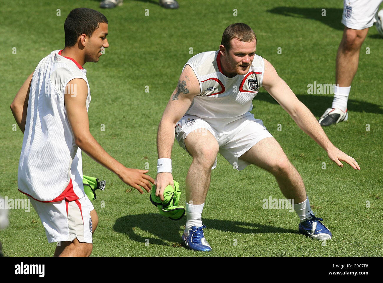 England's Aaron Lennon (L) and Wayne Rooney during a training session ...