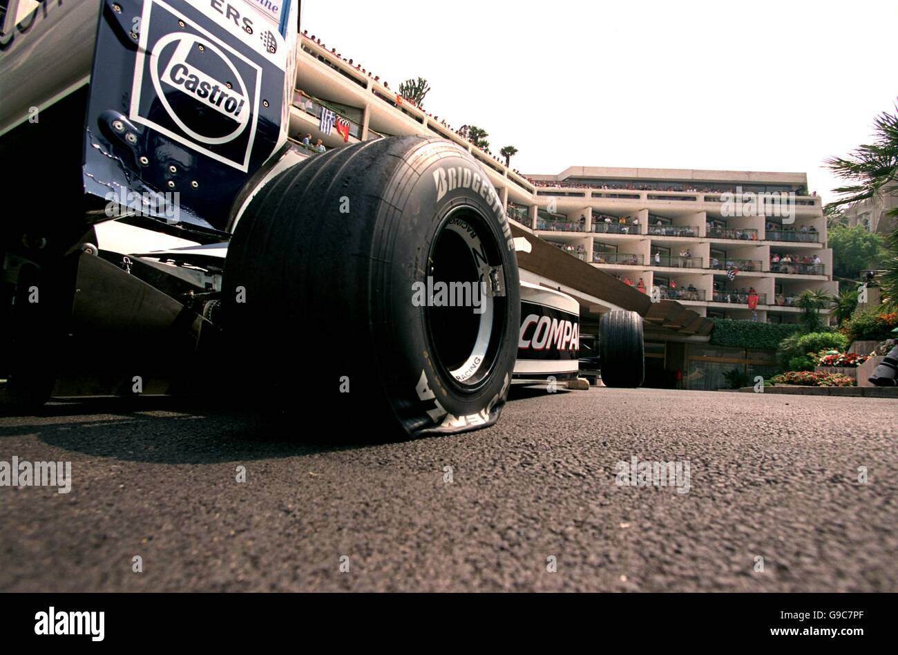 The flat right rear tyre on Jenson Button's Williams, which was ...