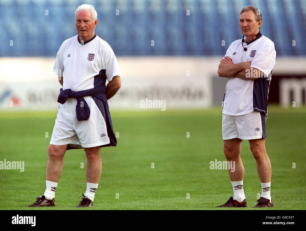 England manager Howard Wilkinson (r) and coach Dave Sexton (l) watch ...