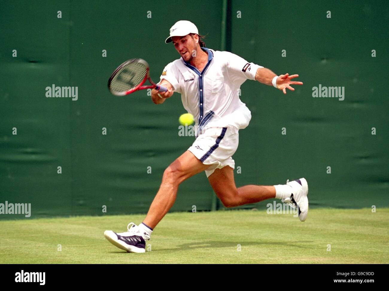 Tennis - Wimbledon Championships - First Round. Pat Rafter in action ...