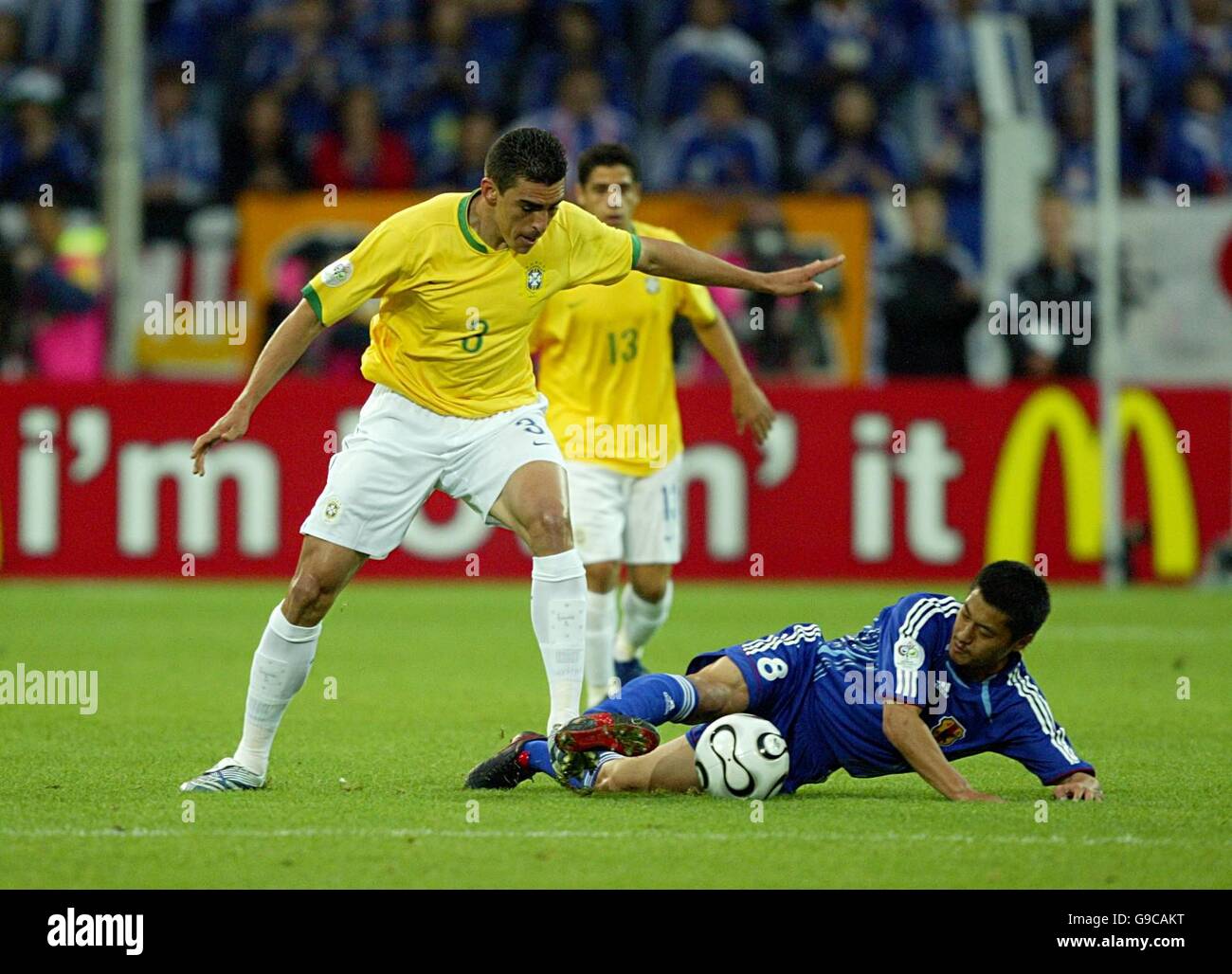 Keisuke Tsuboi, Japan and Lucio, Brazil battle for the ball Stock Photo ...