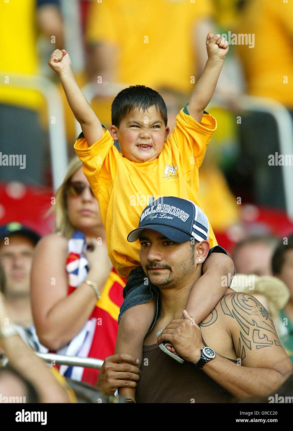 A young Australia fan soaks up the atmosphere prior to the game Stock ...