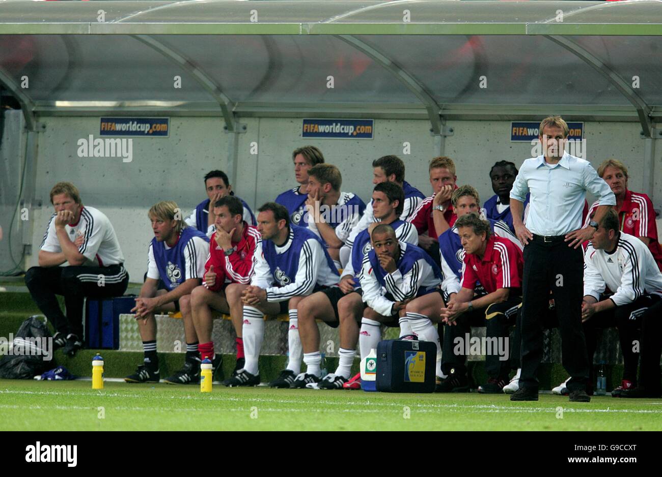 Germany manager Jurgen Klinsmann stands in front of the german bench ...