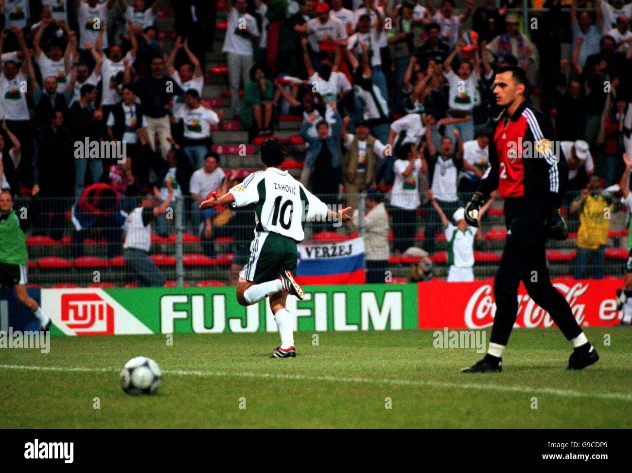 Slovenia's Zlatko Zahovic celebrates scoring his team's third goal of ...