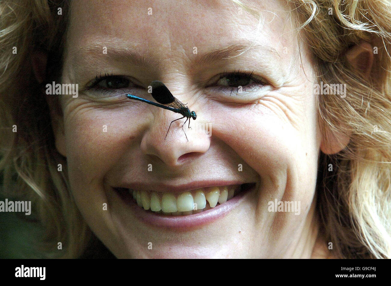 BBC Springwatch presenter Kate Humble poses with a Banded Demoiselle ...