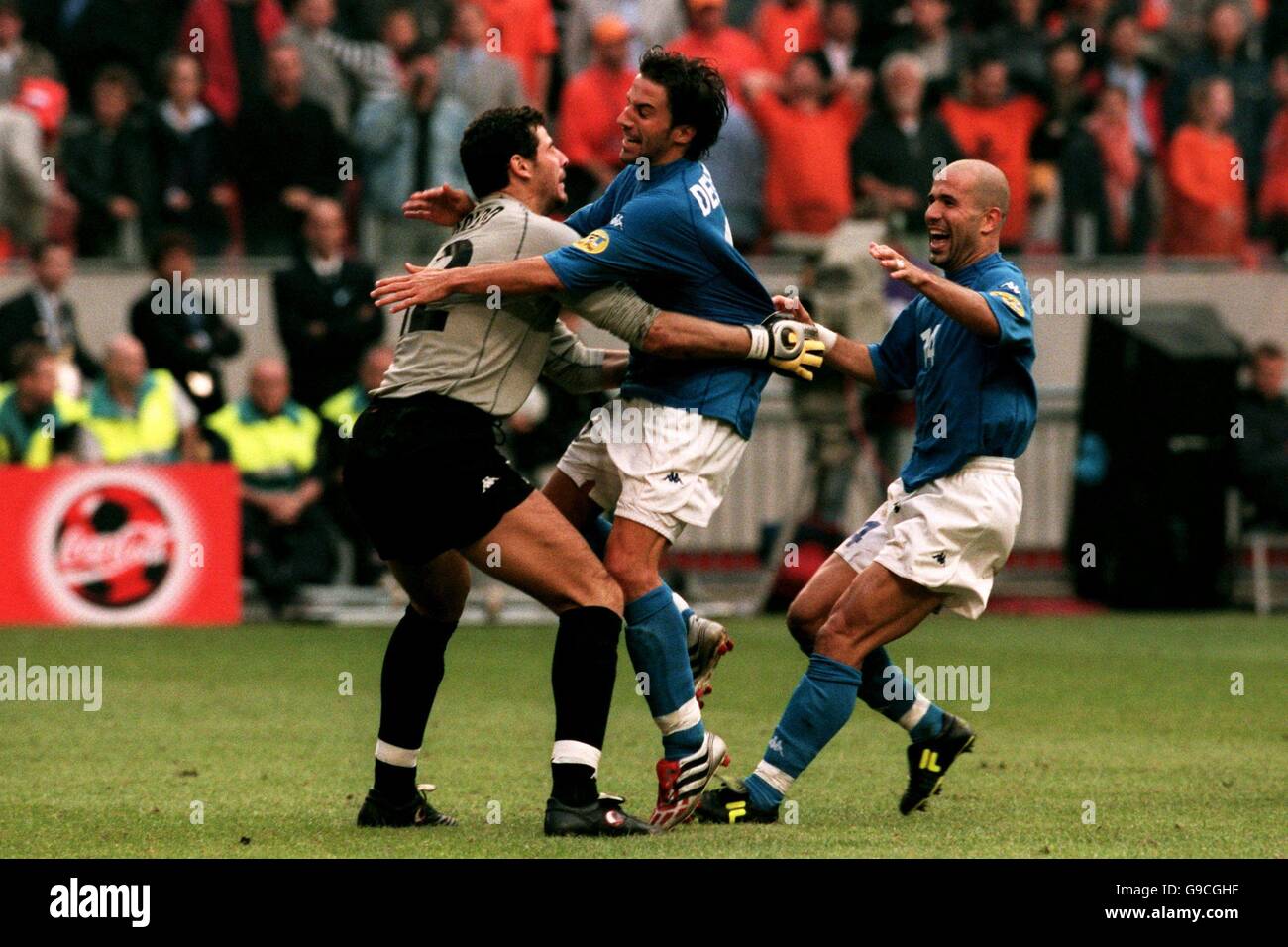 (l-r) Italy goalkeeper Francesco Toldo is mobbed by Alessandro Del ...