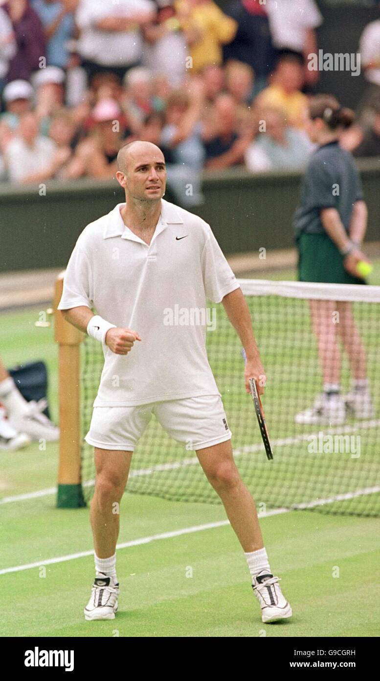 Tennis - Wimbledon Championships - Third Round. Andre Agassi celebrates ...