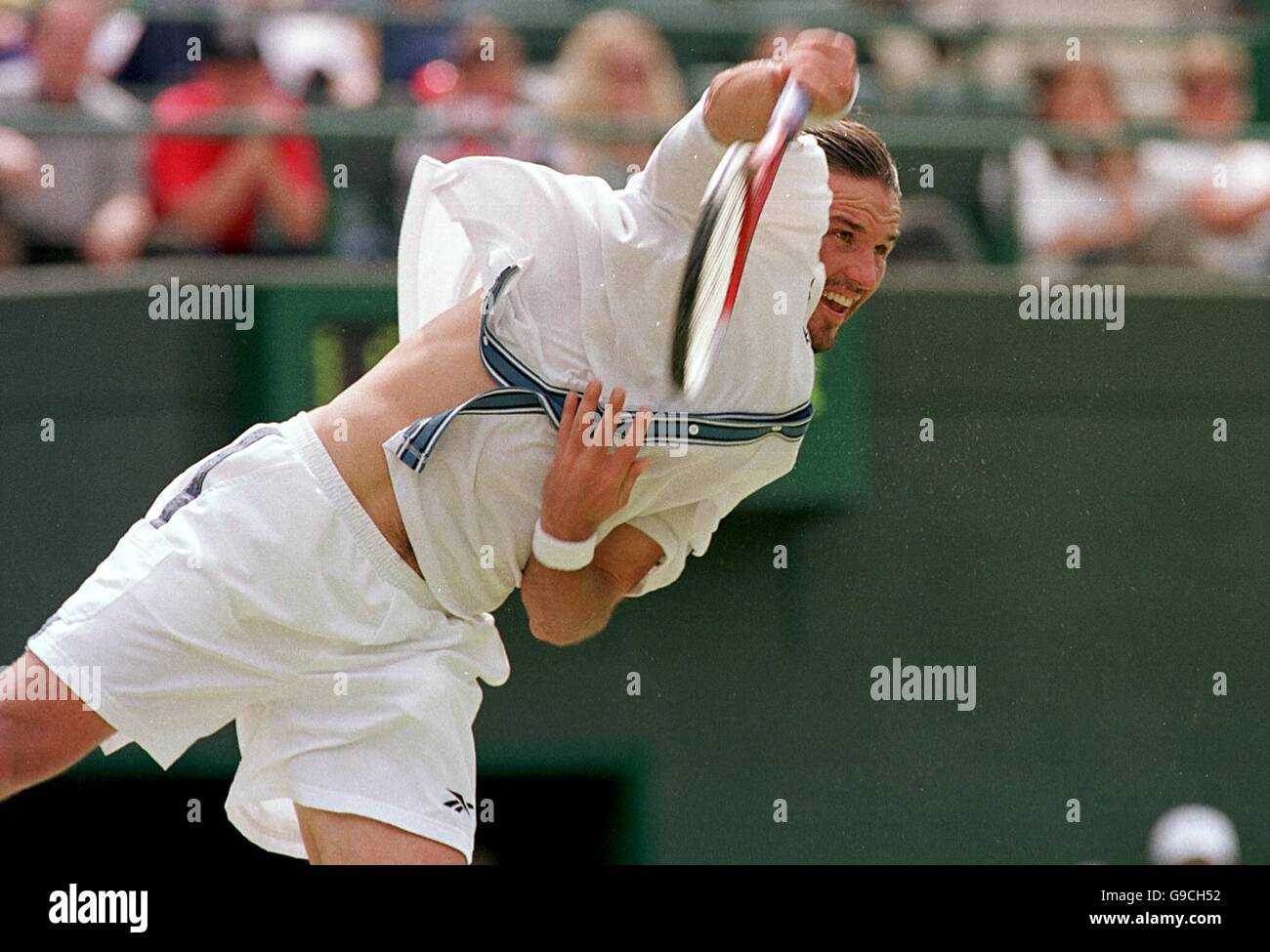 Pat Rafter in action during his win in the third round against Rainer ...