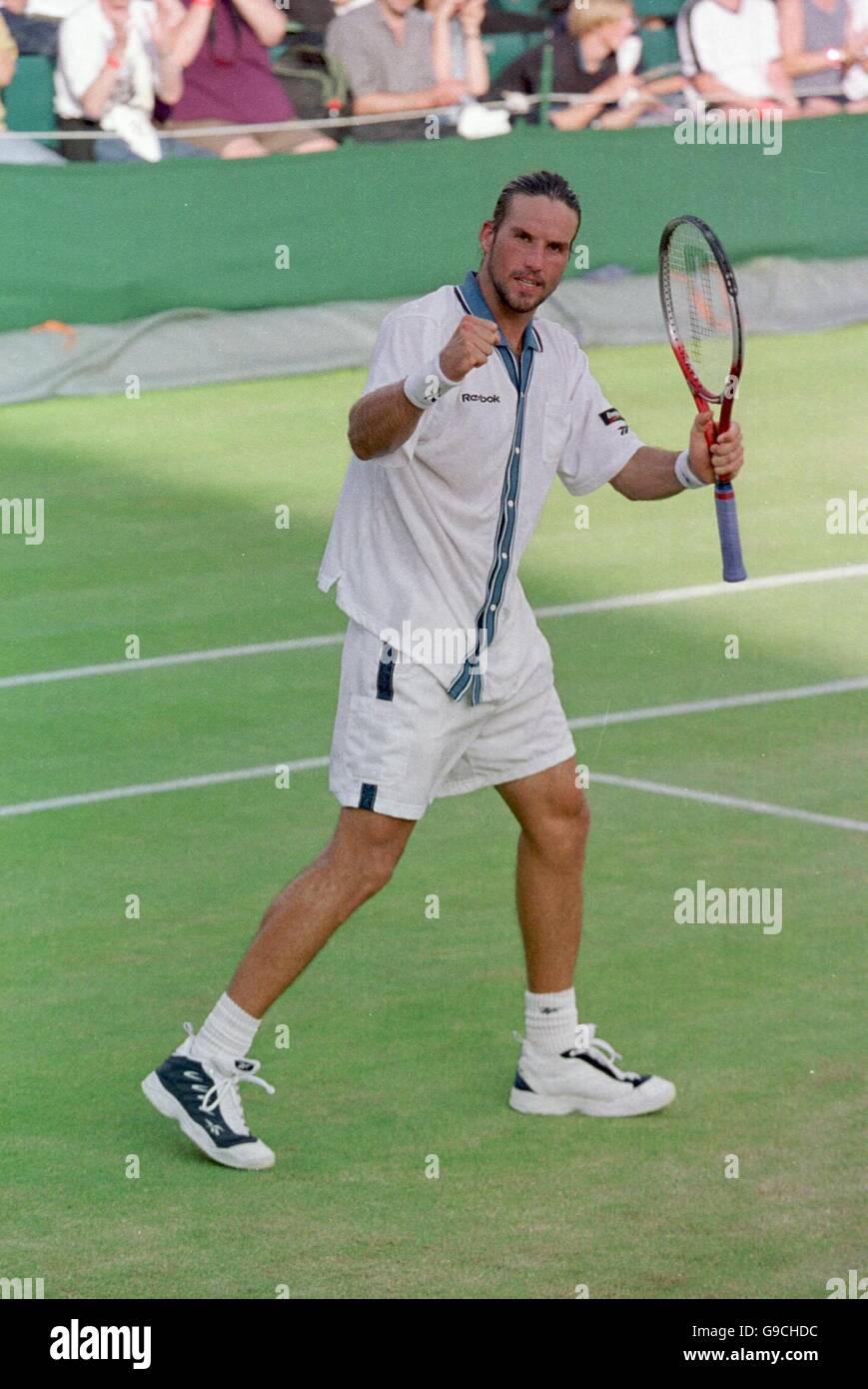 Tennis - Wimbledon Championships - Fourth Round. Pat Rafter celebrates ...
