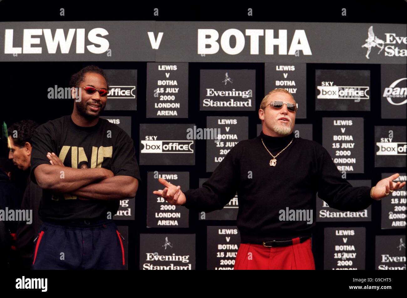 Champion Lennox Lewis (l) watches his challenger Frans Botha (r) joke ...