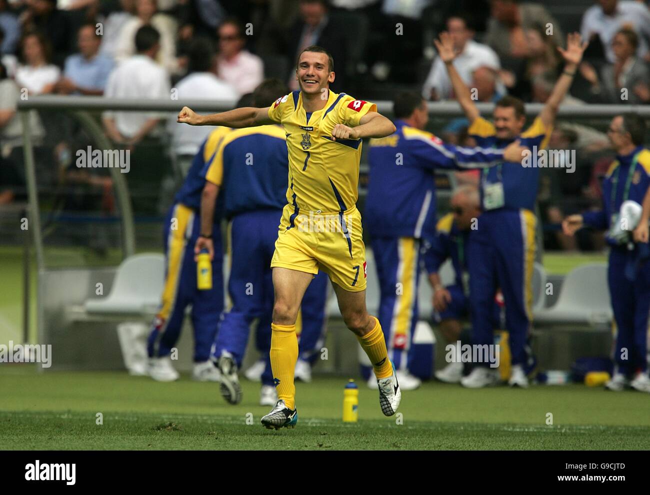 Ukraine's Andriy Shevchenko comes off the bench to celebrate at the end ...
