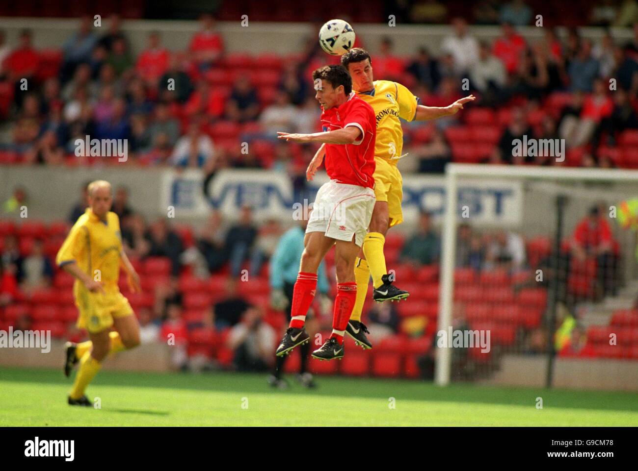 (L-R) Nottingham Forest's David Prutton challenges for the ball in the ...