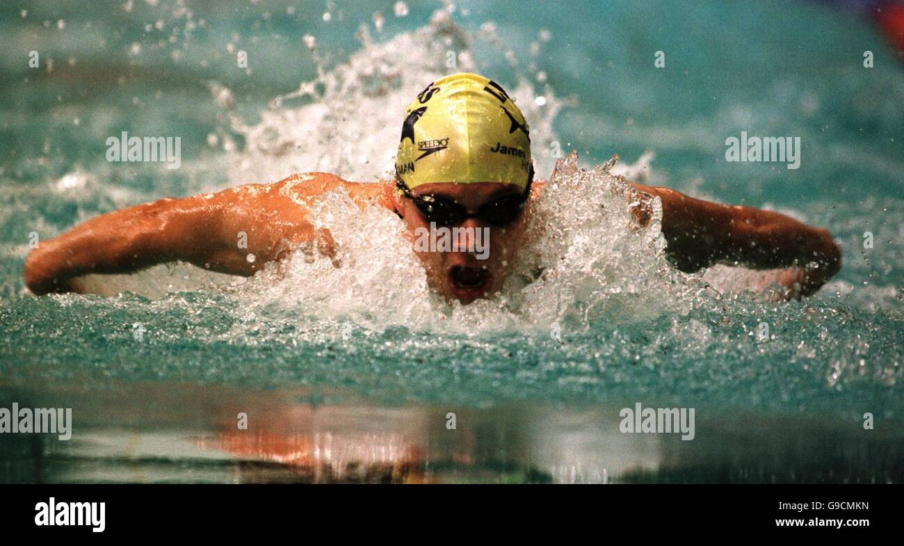 James Hickman on his way to victory in the Men's 100m Butterfly Stock ...