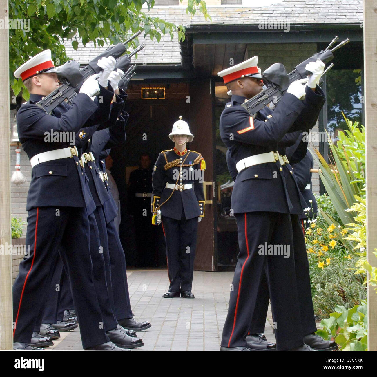 Royal Marines fire a volley of rifle shots at the funeral of 21-year ...