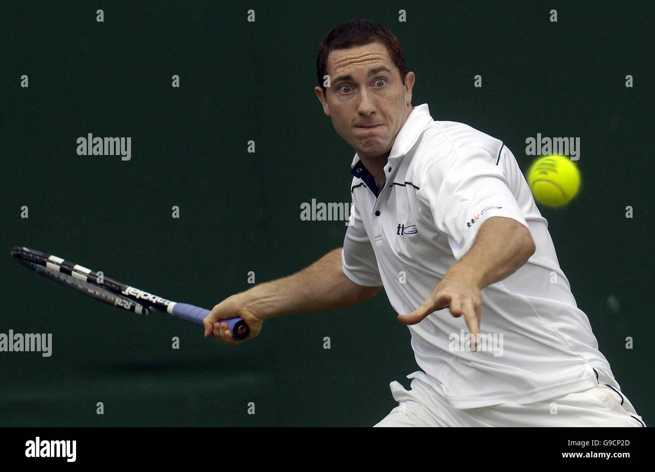 Great Britain's Alan Mackin in action against Cyprus' Marcos Baghdatis ...