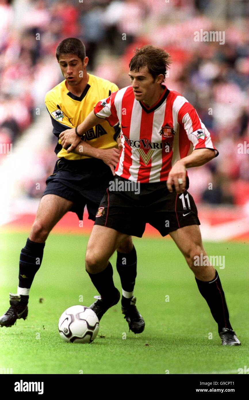 Sunderland's Kevin Kilbane (r) holds off Arsenal's Silvinho (l Stock ...