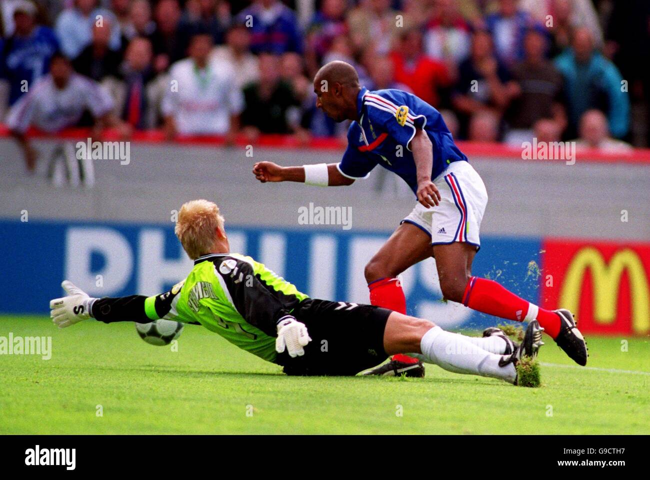 (L-R) Denmark goalkeeper Peter Schmeichel stretches for the ball as ...