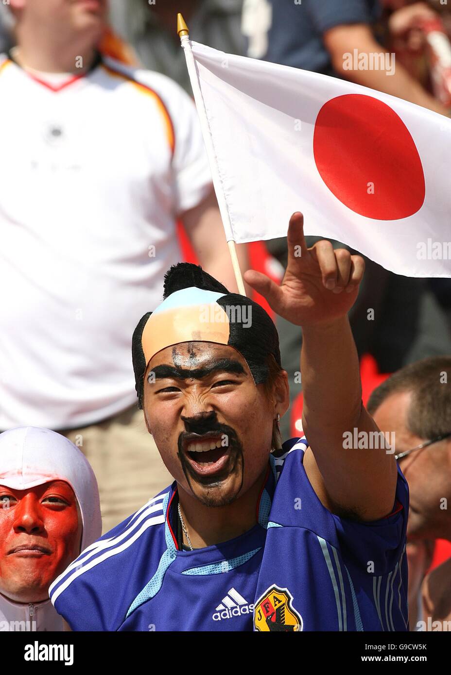 Half length top half face paint pointing national flag hi-res stock ...