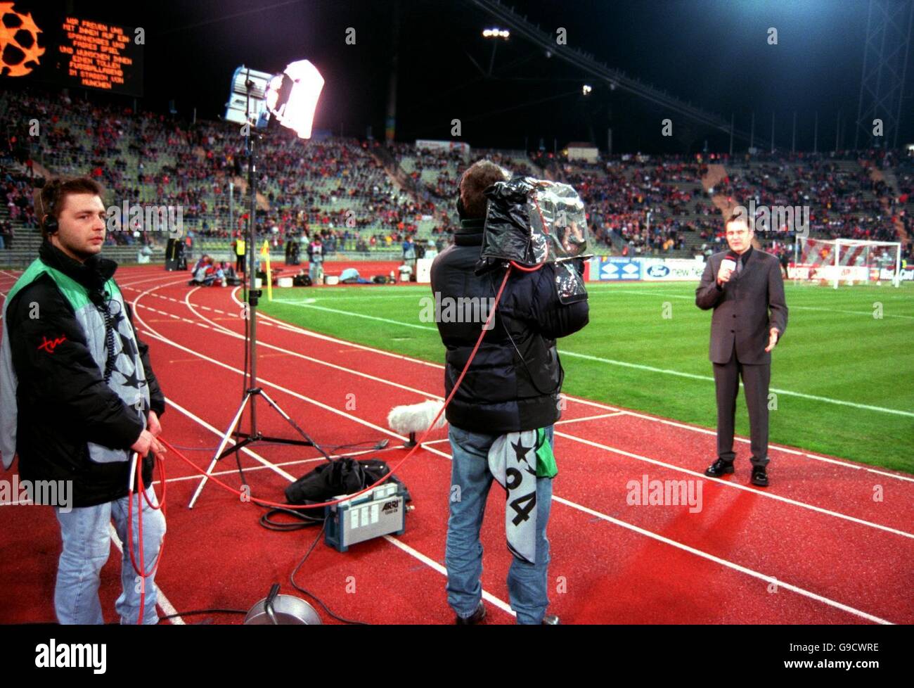Pitchside interview camera hi-res stock photography and images - Alamy