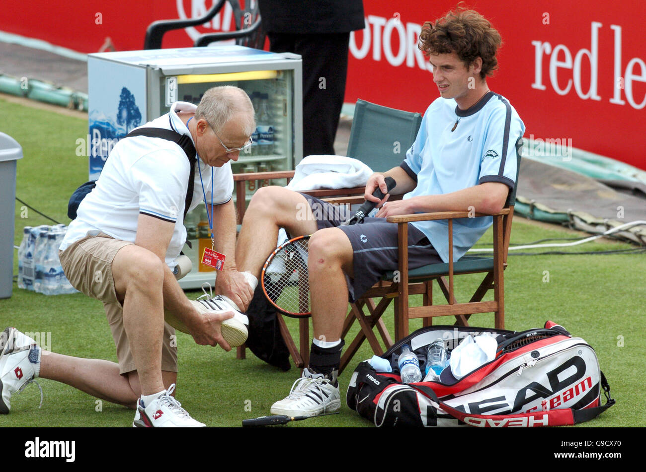 Great Britain's Andy Murray receives treatment on his ankle by the ...