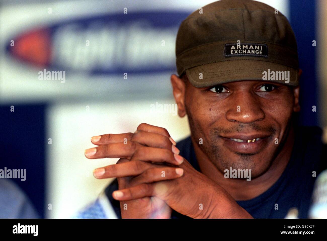 Mike Tyson is all smiles at today's press conference at the Hilton ...