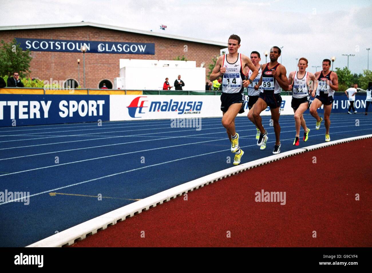 Great Britain's Michael East leads the group in the men's mile Stock ...