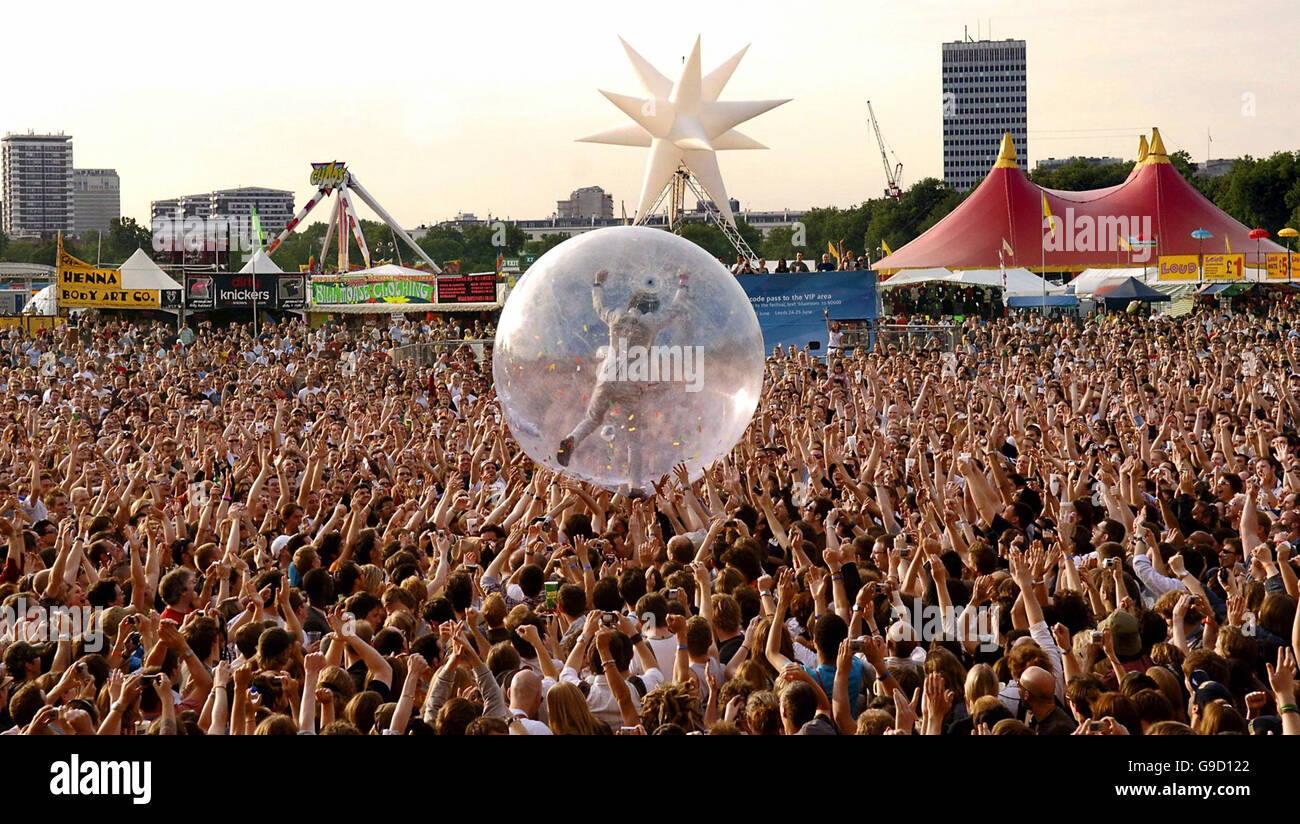 Flaming Lips singer Wayne Coyne crowd surfs in a giant sphere as the ...