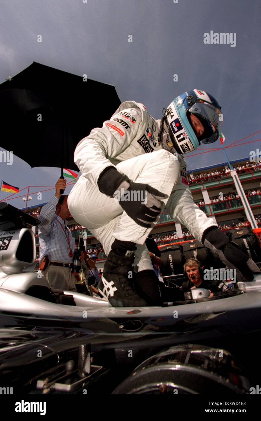 Formula One Motor Racing - French Grand Prix. Mika Hakkinen climbs into ...