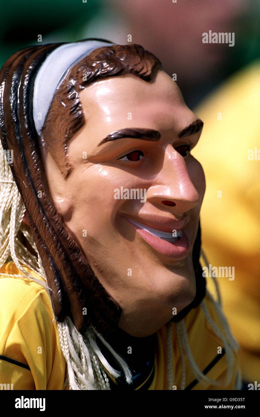 A celtic fan wearing a henrik larsson mask hi-res stock photography and ...