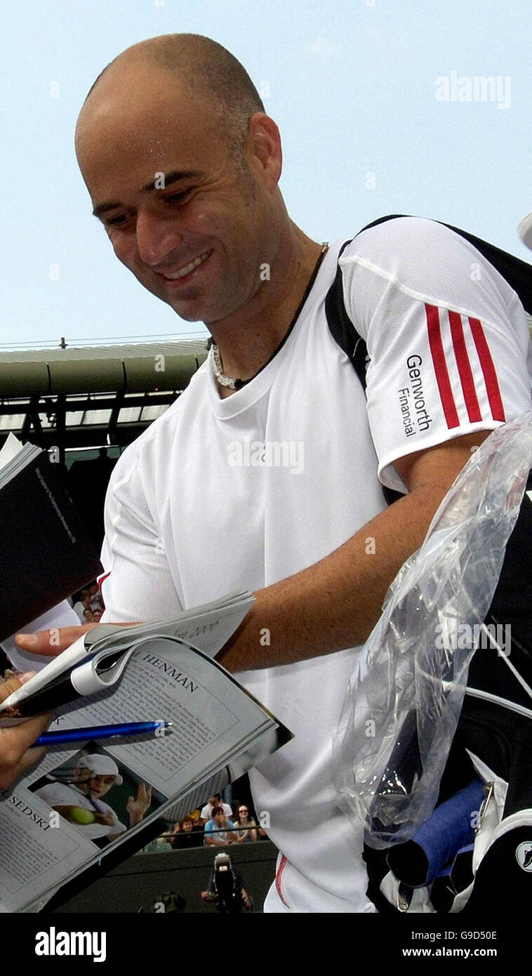 USA's Andre Agassi signs autographs after his win against Italy's ...