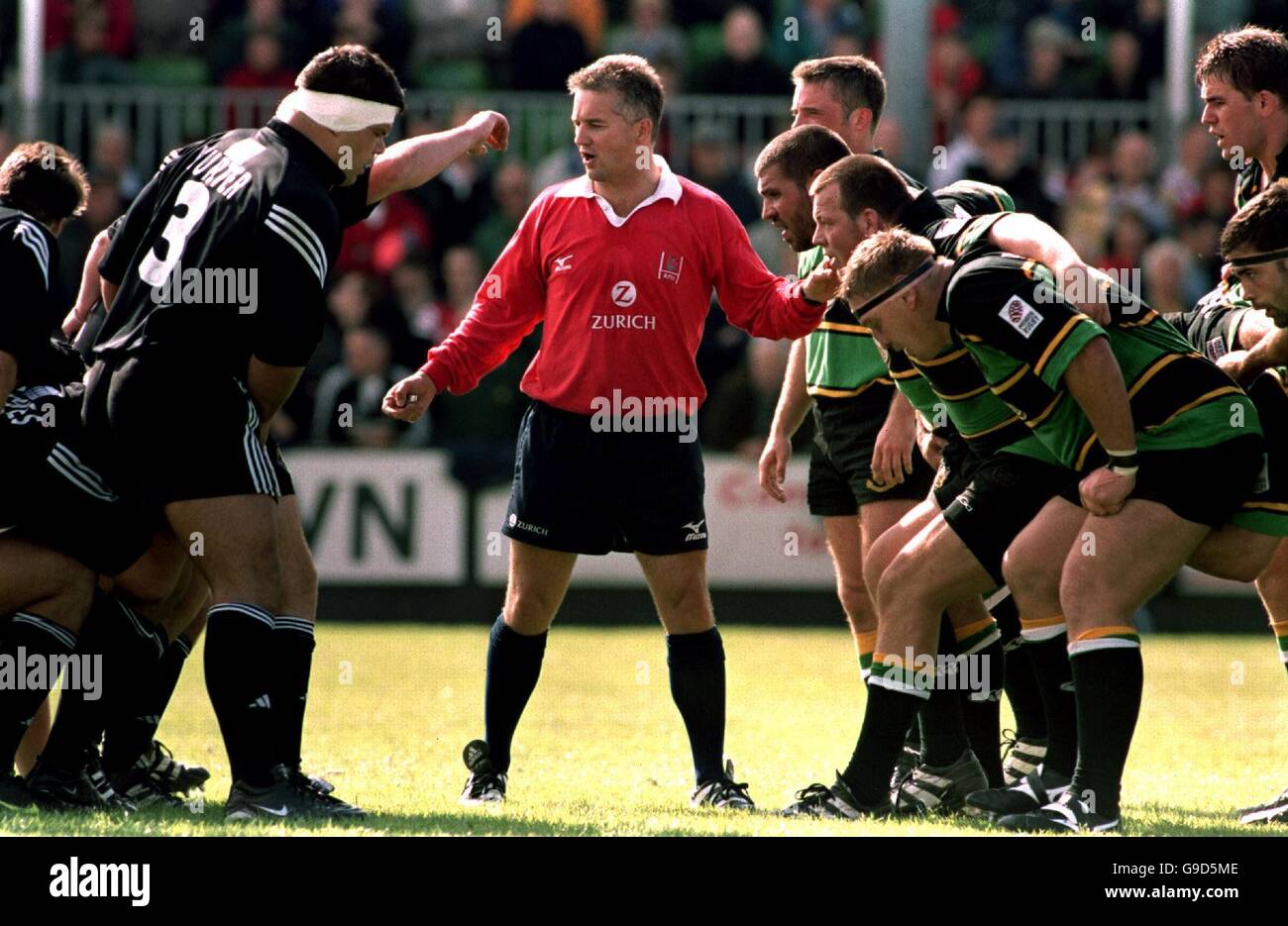 Referee Chris White separates the Newcastle Falcons and Northampton ...