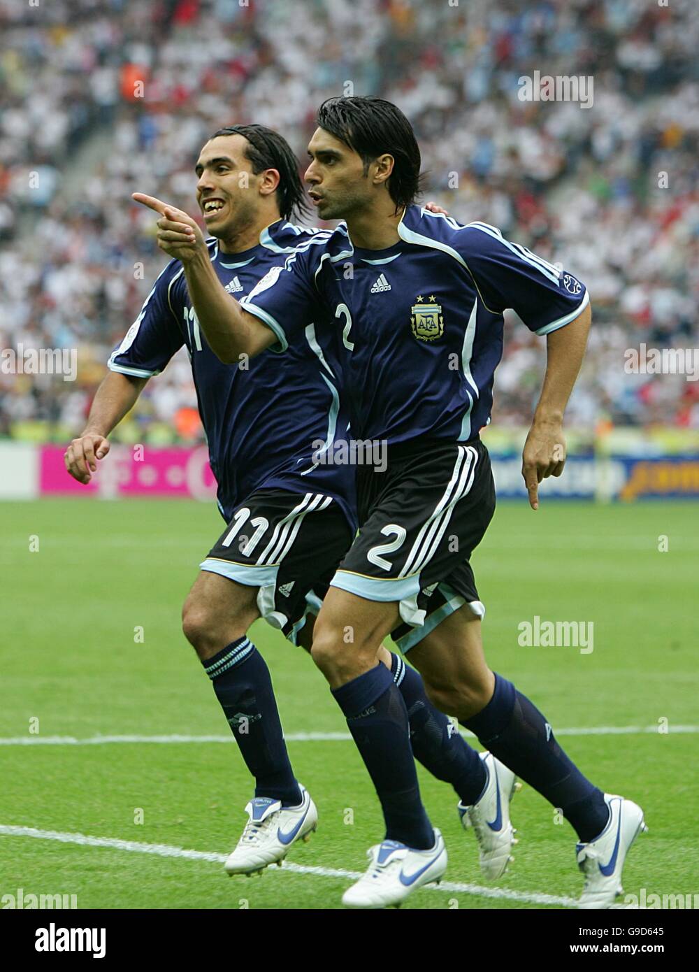 Roberto ayala celebrates with carlos tevez after scoring for argentina ...