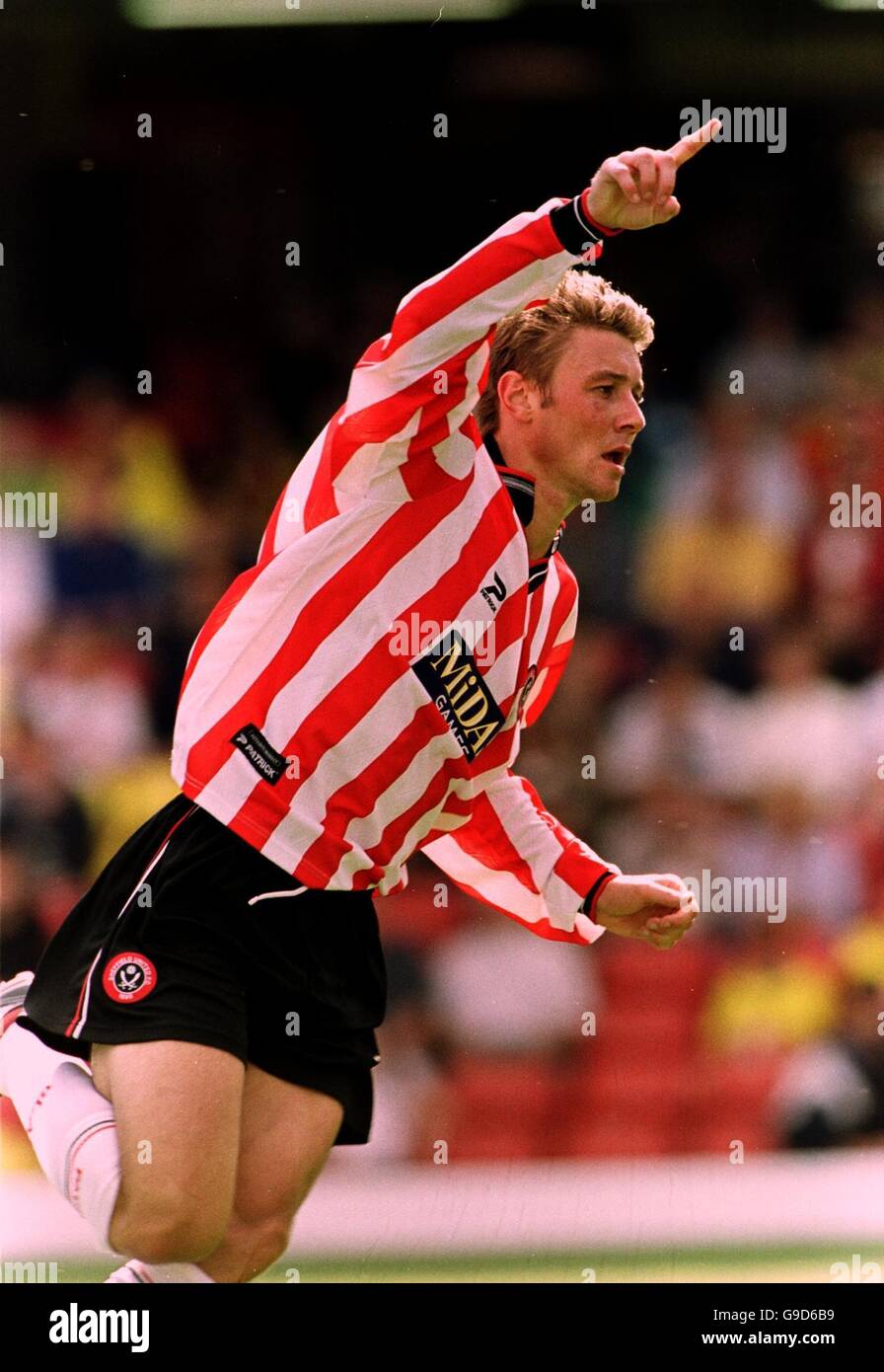 Sheffield United's Wayne Quinn celebrates scoring the equalizer to make ...