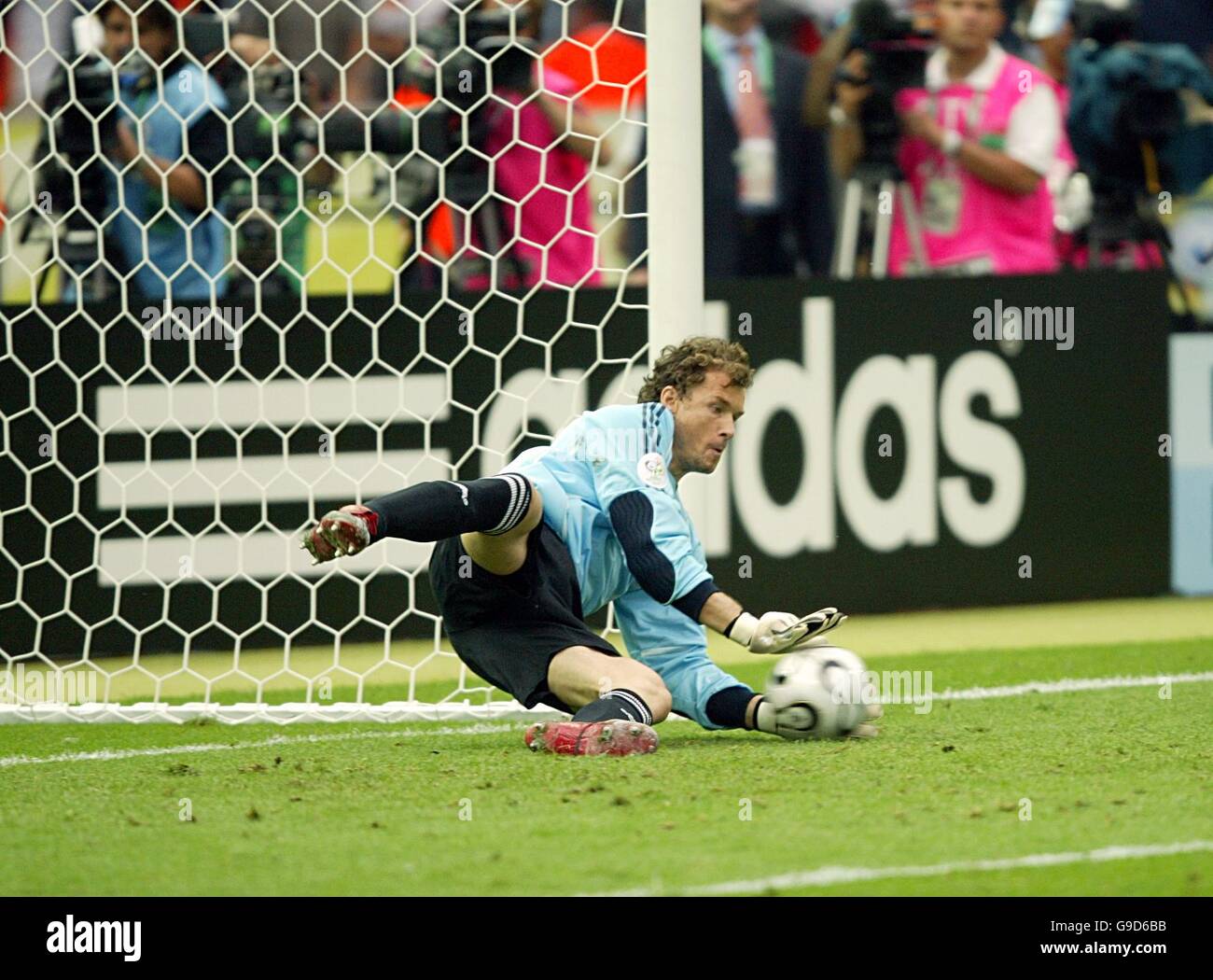 Germany's Jens Lehmann saves from Argentina's Roberto Ayala during the ...