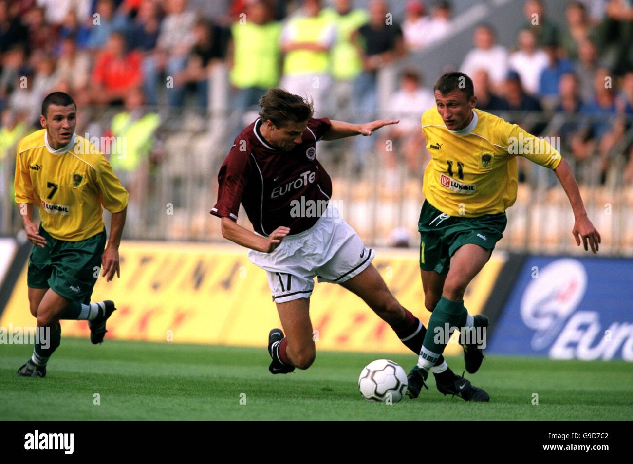 Sparta Prague's Pavel Novotny (l) dives in to tackle Zimbru Chisinau's ...