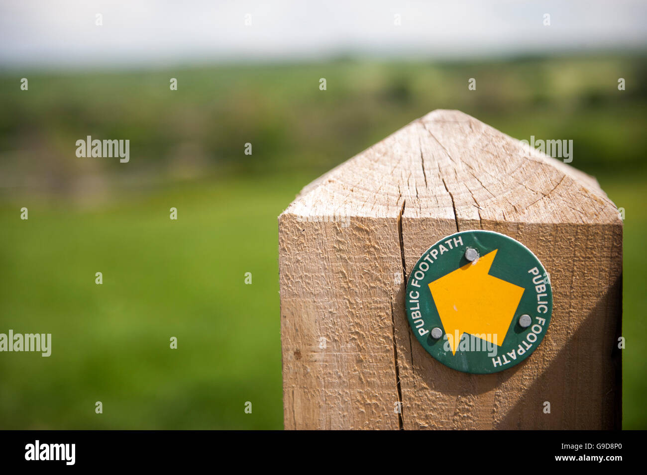 Public Footpath indicator on a gate post in farmyard in the Forest of ...