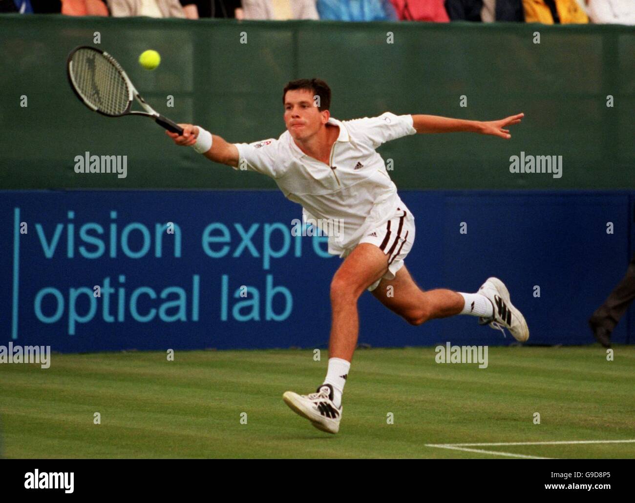 Tim henman stretches for the ball hi-res stock photography and images ...