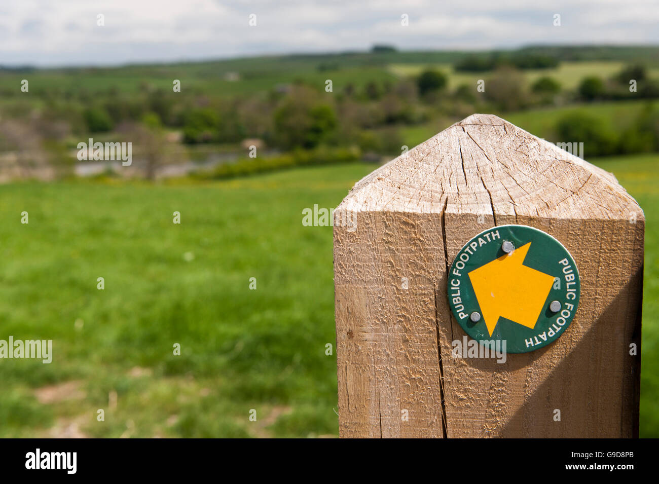 Public Footpath indicator on a gate post in farmyard in the Forest of ...