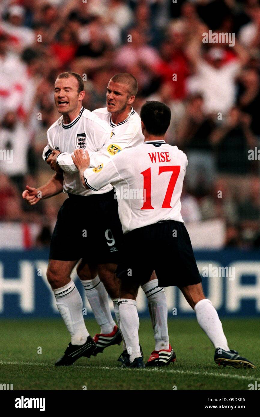 Englands alan shearer celebrates england first goal with david beckham ...