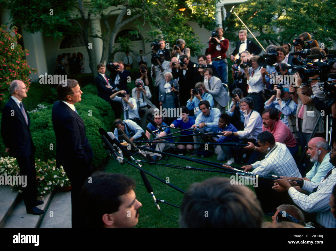 President George H.W. Bush carries hs dog Ranger to Marine One for a ...