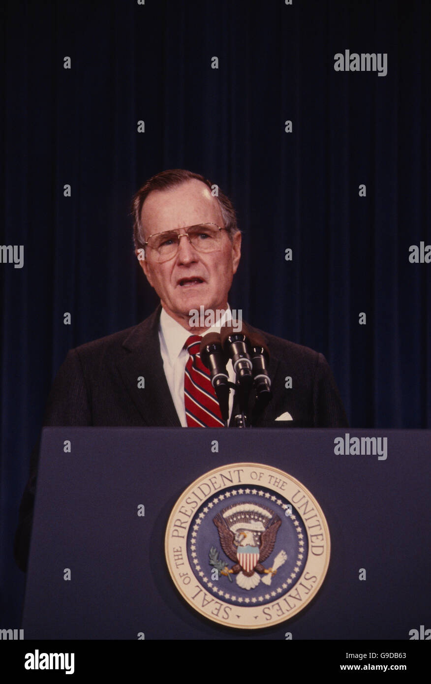 President George H.W. Bush carries hs dog Ranger to Marine One for a ...